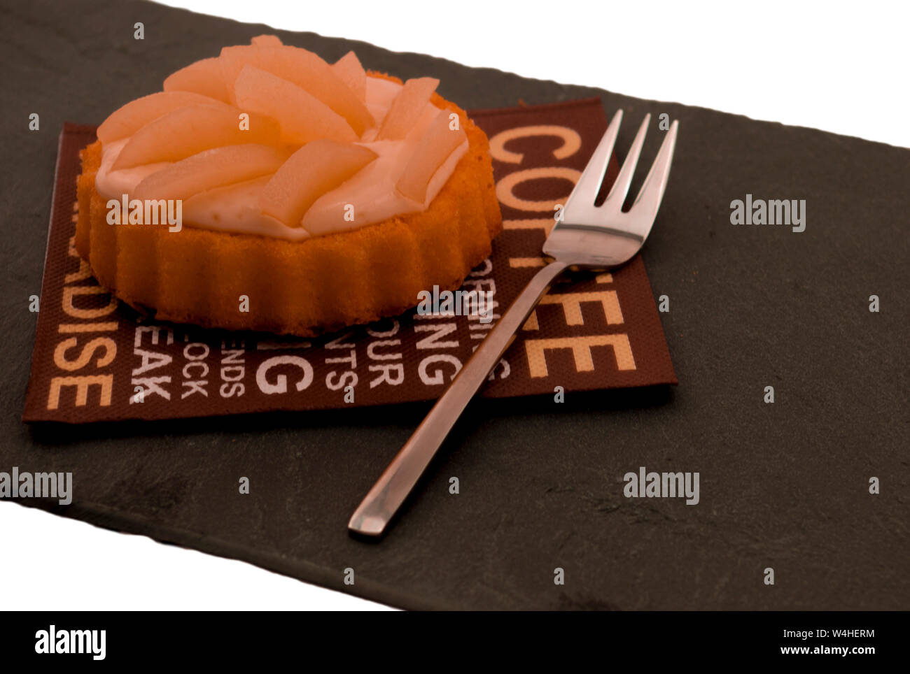 Sponge dessert with cream and pear Stock Photo - Alamy