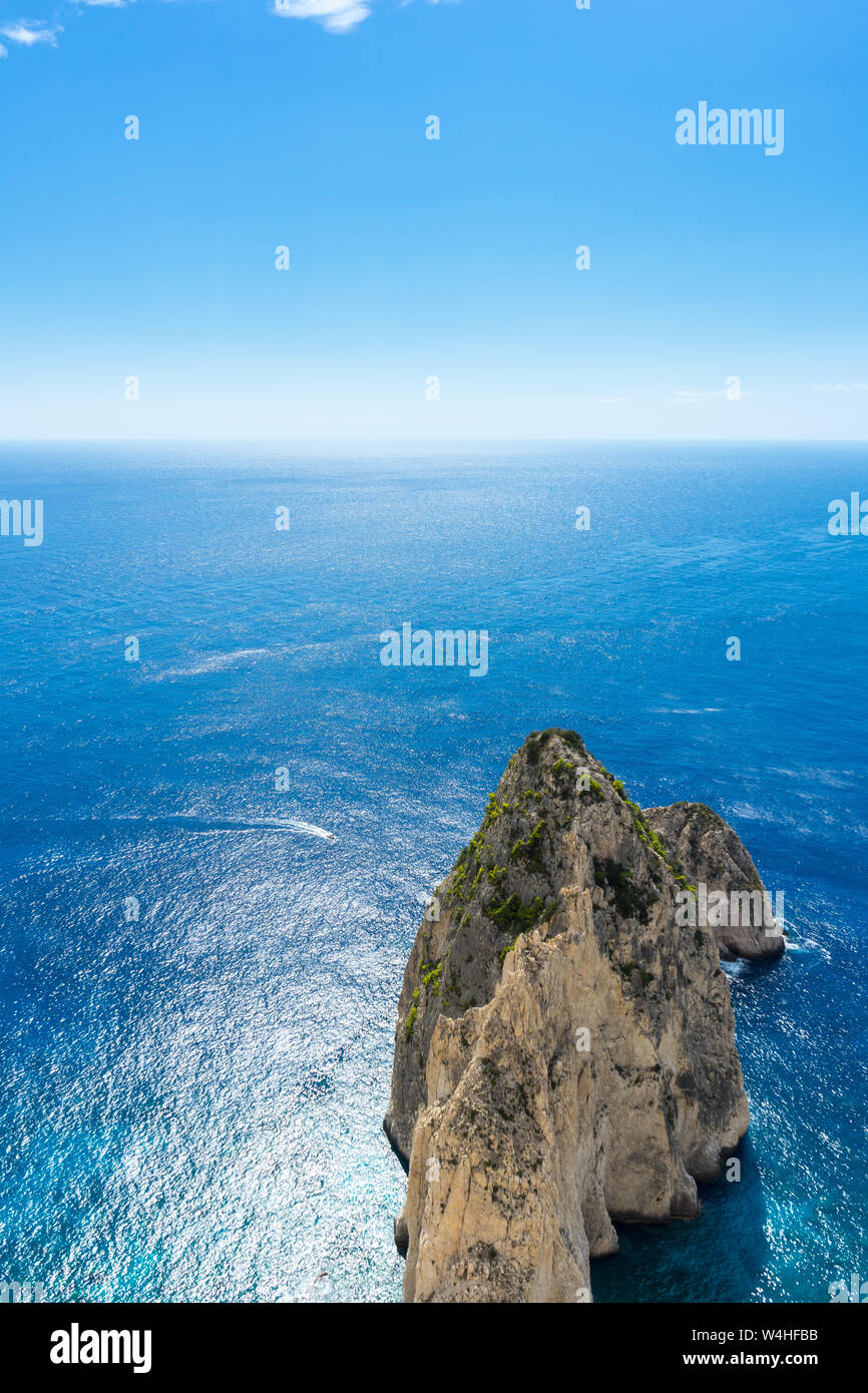 Greece, Zakynthos, Two little islands of rock of Mizithres in blue ...