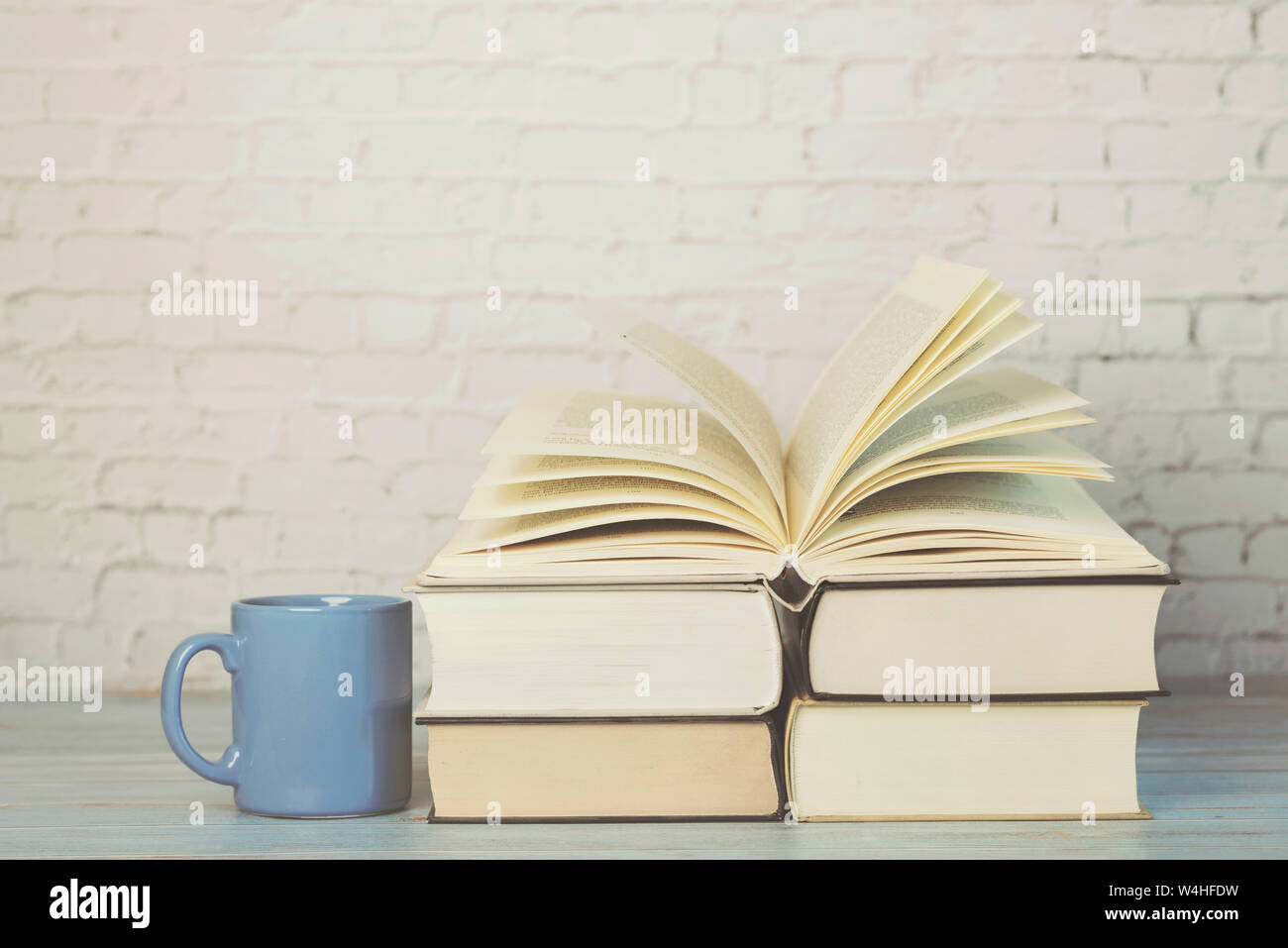 Stacked Books And Coffee
