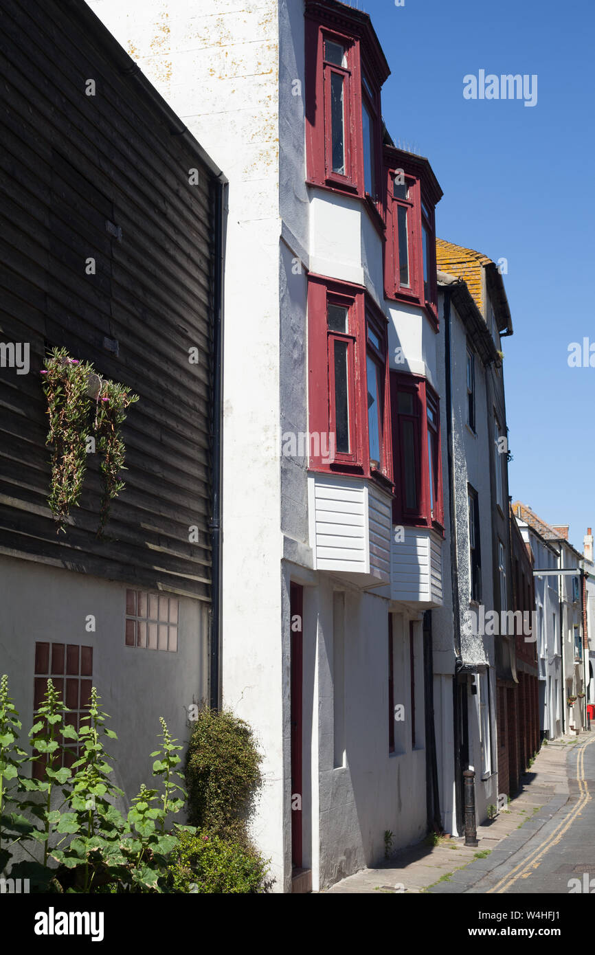 Typical narrow back street in the Hastings Old Town, East Sussex, UK ...