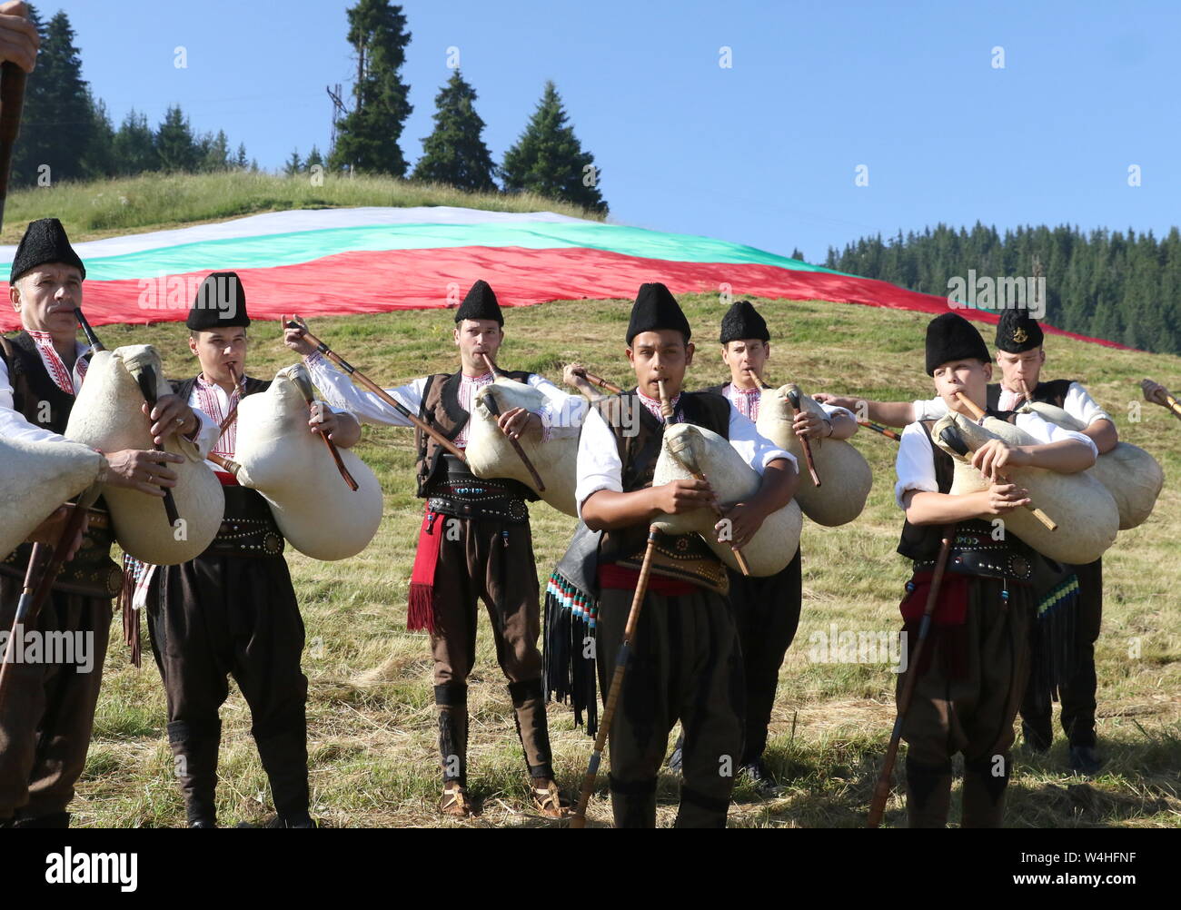 Rozhen, Bulgaria - July 19, 2019: Rhodope bagpipers playing tunes on a ...