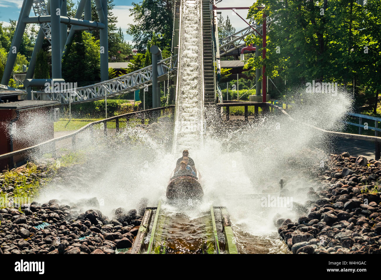 Fun water ride Log river in amusement park at summer Stock Photo - Alamy