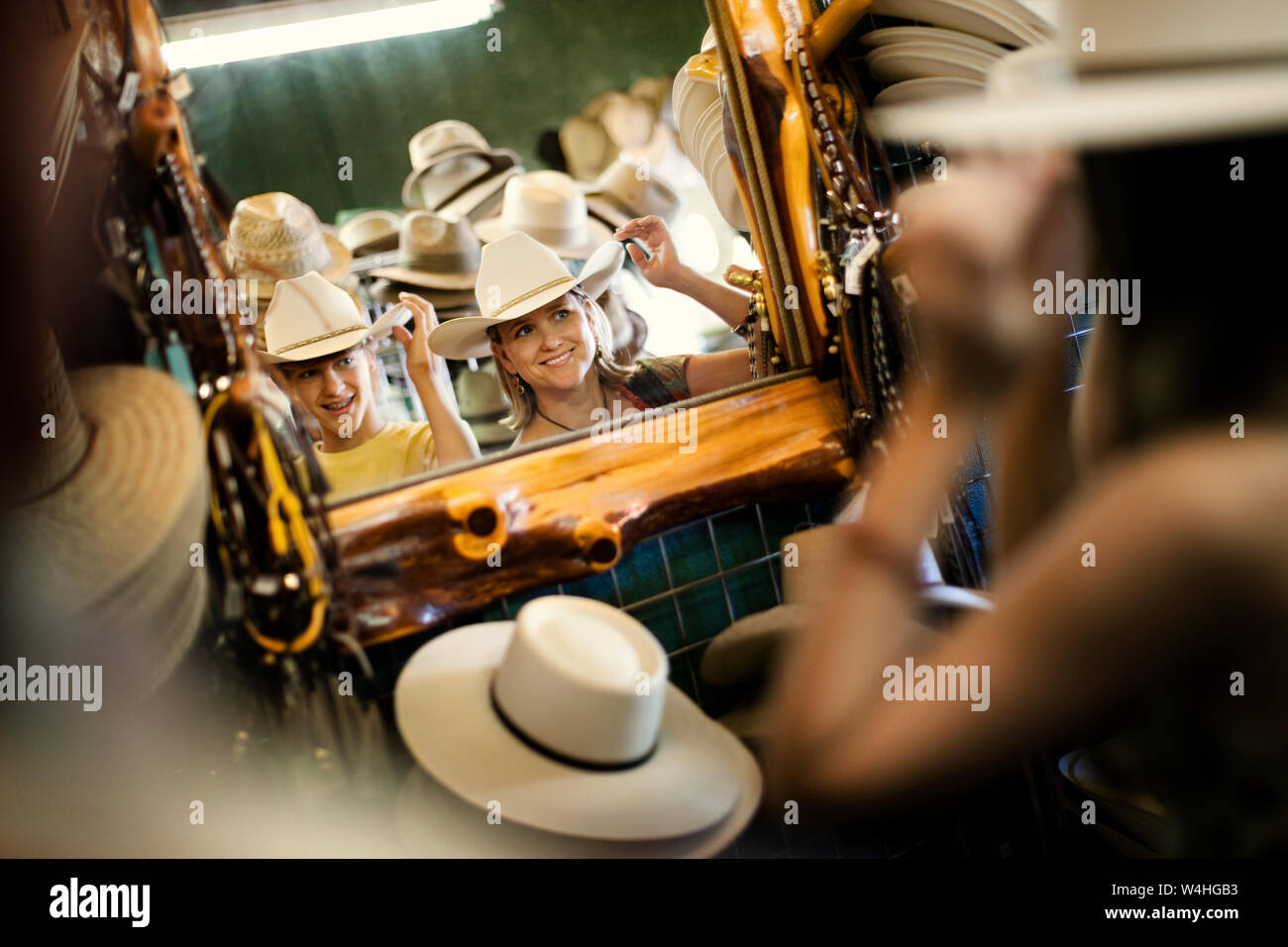 Smiling mother and son looking at their reflection in a mirror Stock ...