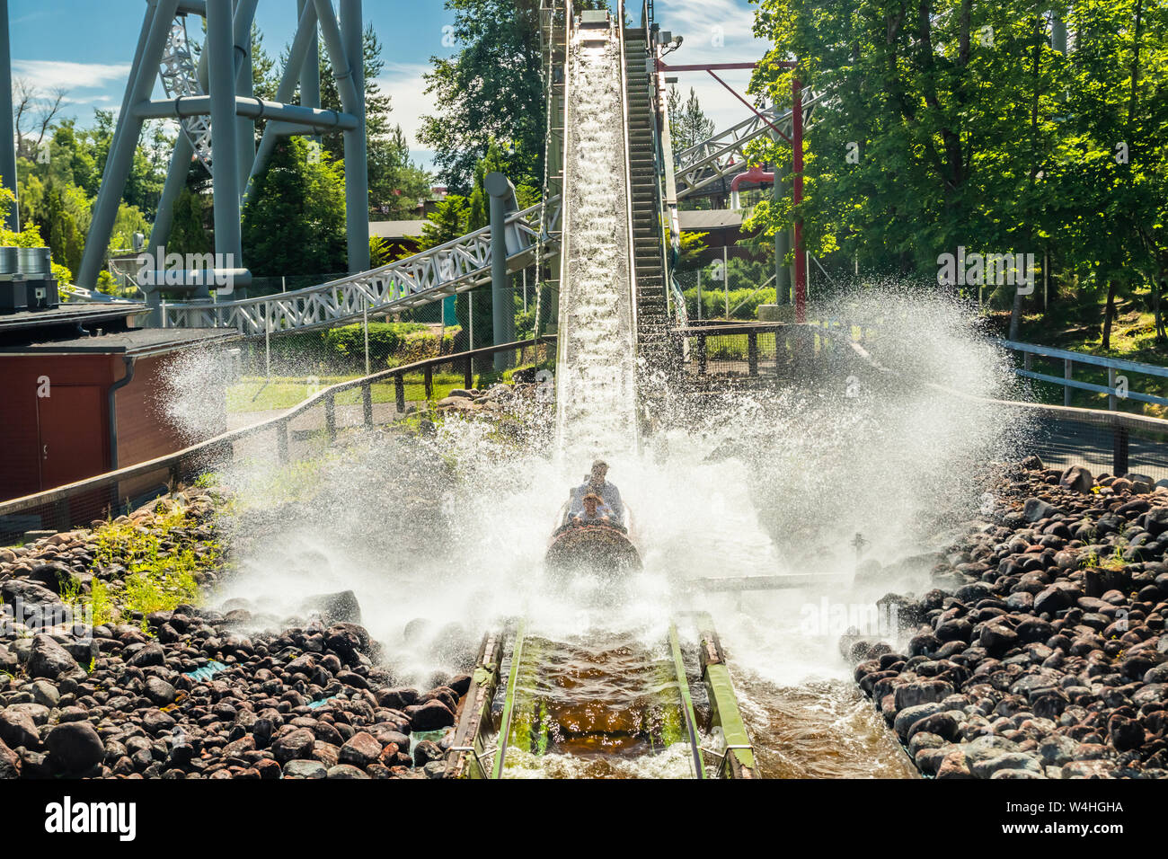 Fun water ride Log river in amusement park at summer Stock Photo - Alamy