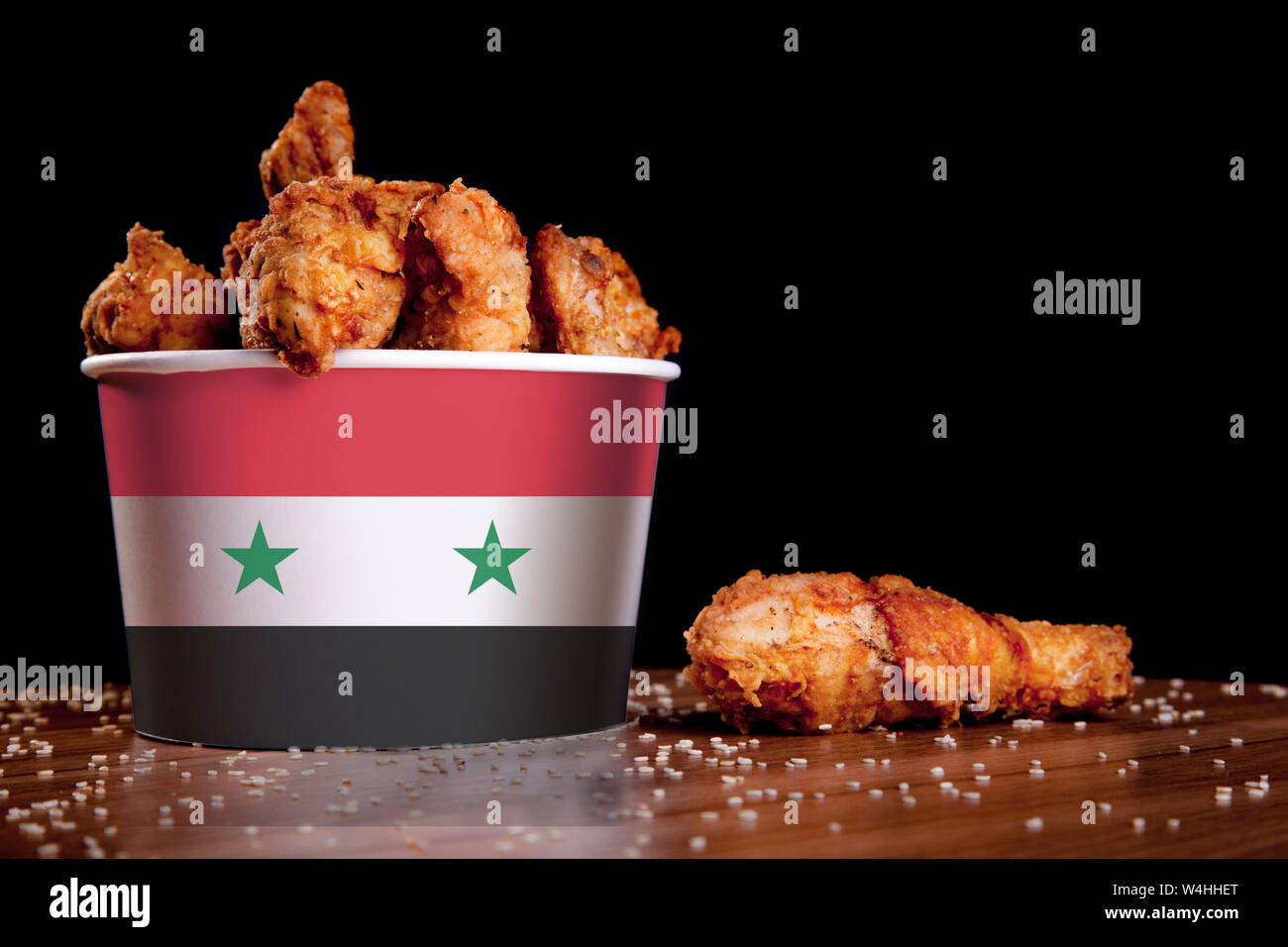 BBQ Chicken wings in bucket flag of United Arab Republic on a wooden ...