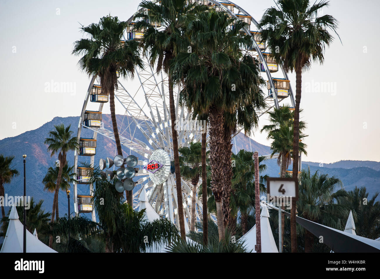 Ferris wheel and palm trees at Coachella Music Festival Stock Photo - Alamy