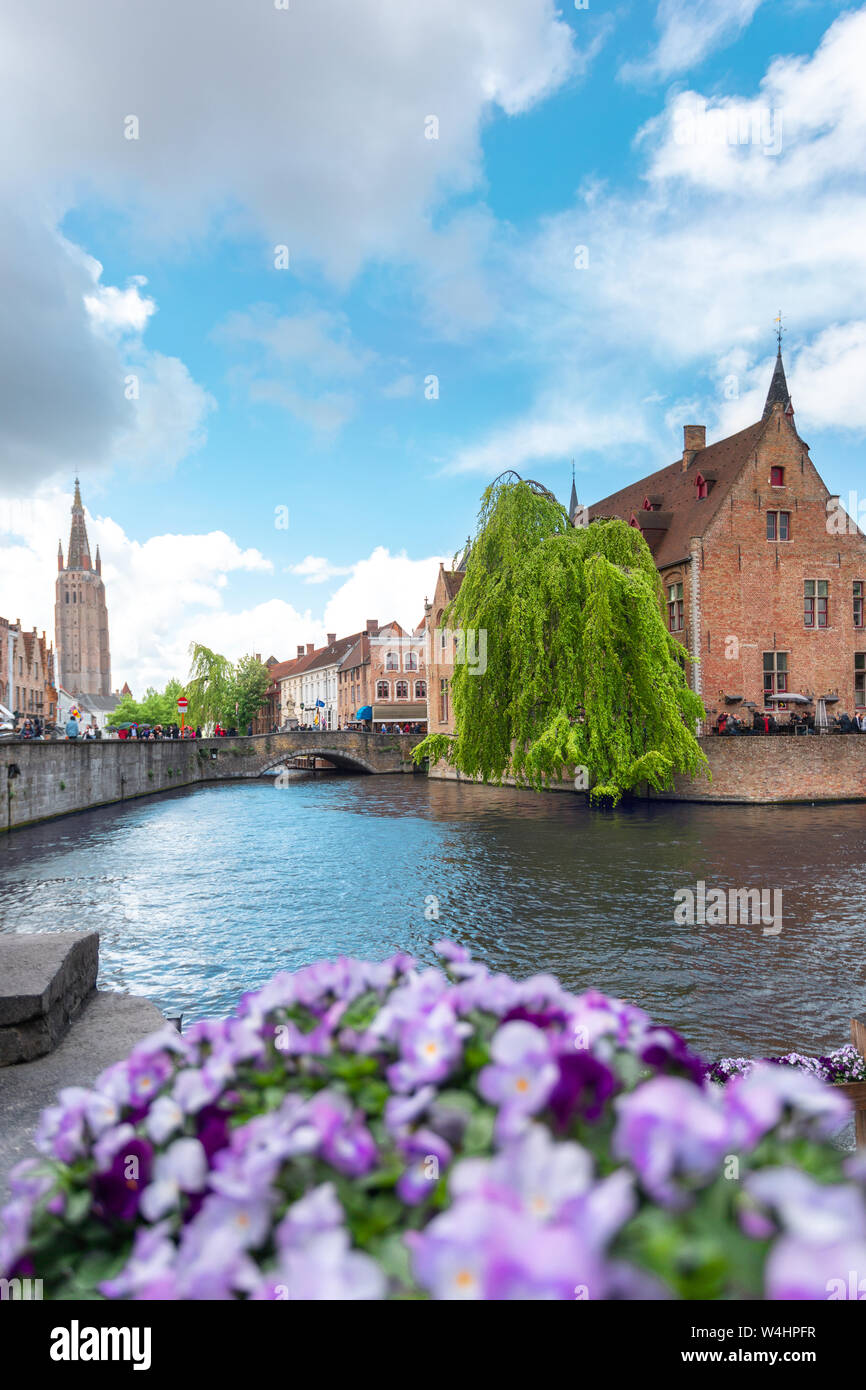 Panoramic city view with Belfry tower and famous canal in Bruges ...