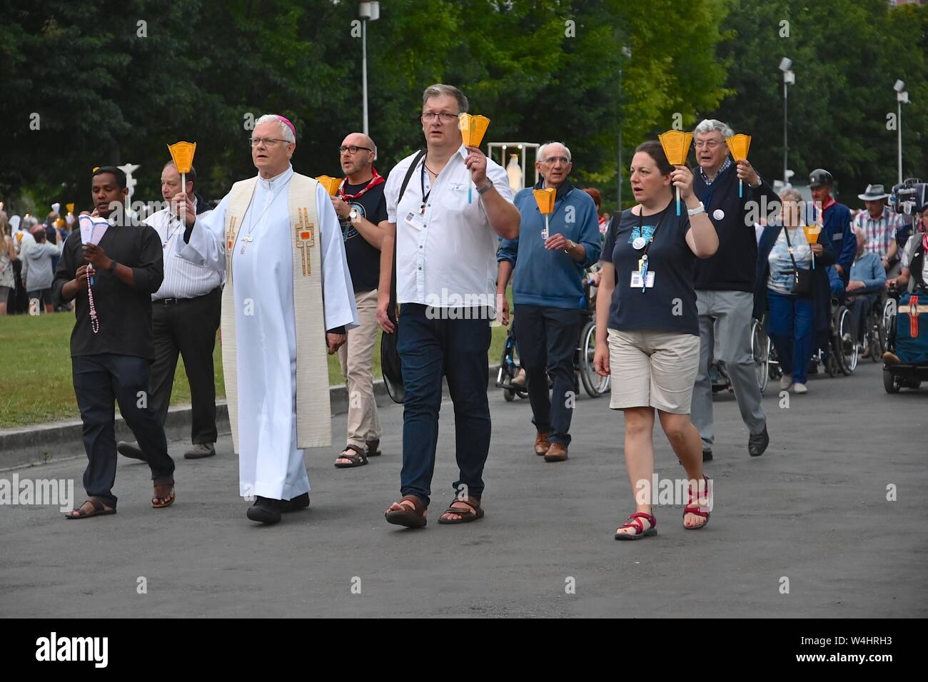 Pilgrims in the Marian procession in Lourdes, France Stock Photo - Alamy