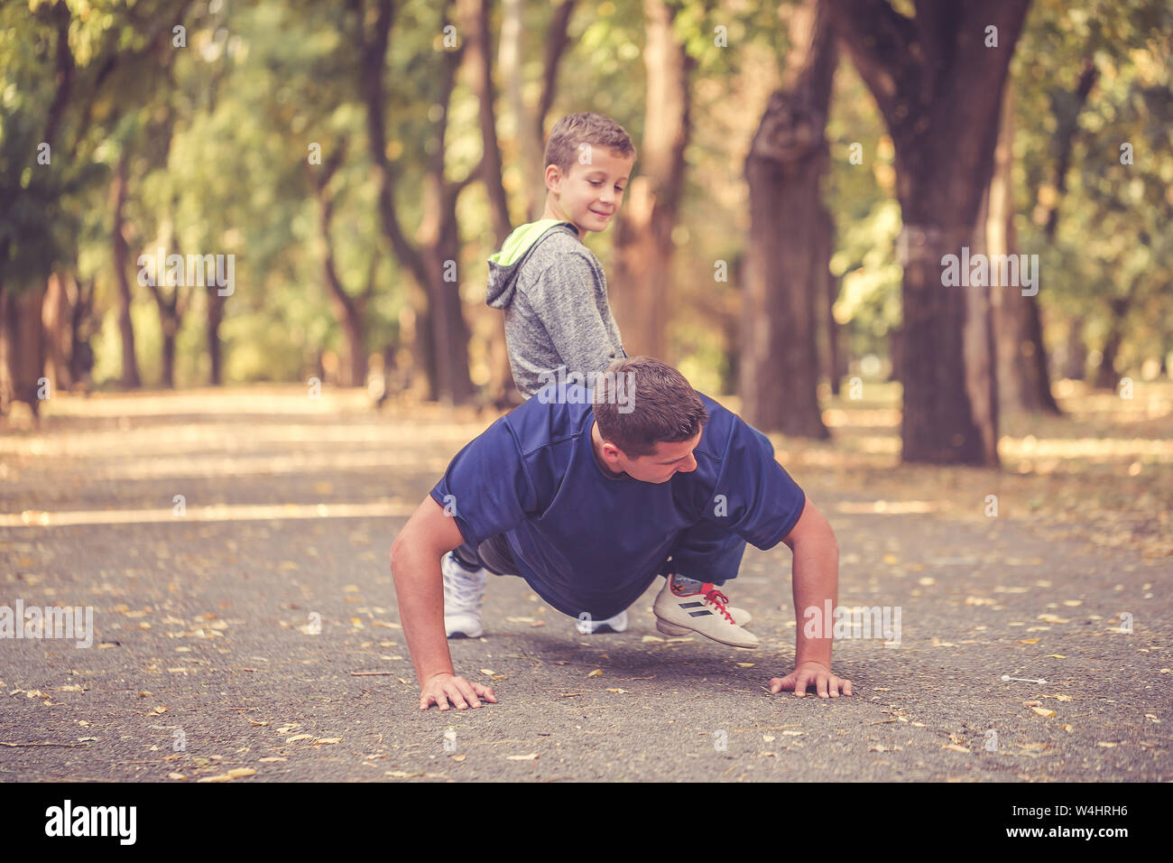 Father son doing push ups hi-res stock photography and images - Alamy