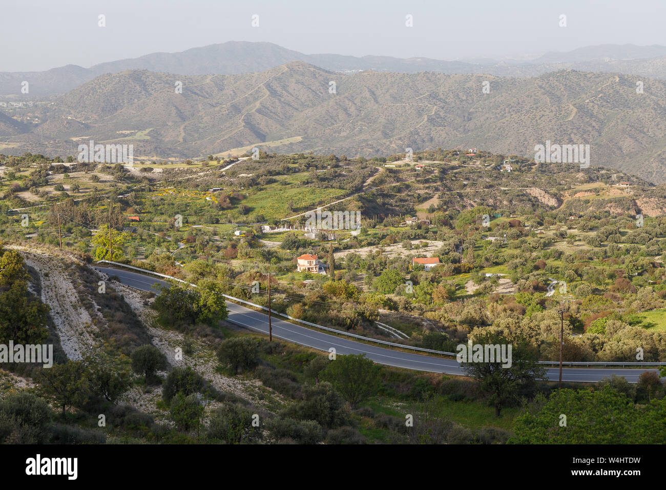 Traditional rural greek scenic mountaine view, olives and other trees ...