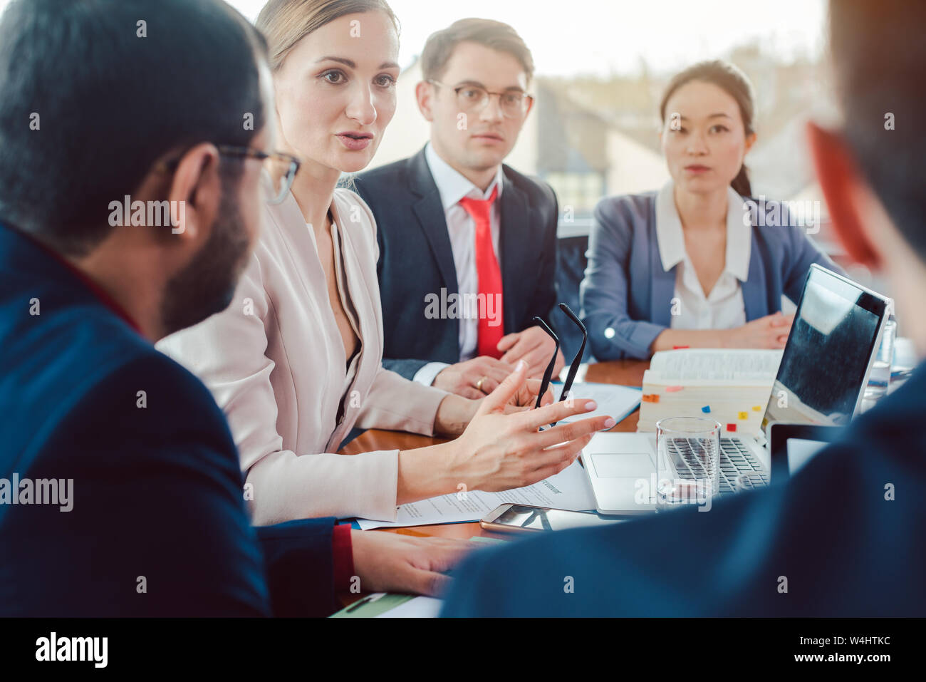 Business team in the office working on a project Stock Photo - Alamy