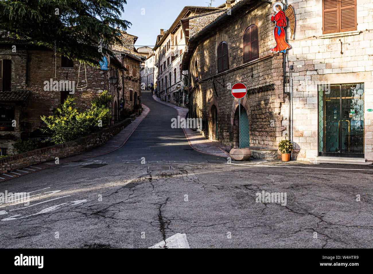 Street inside the walls of Assisi. Assisi, Province of Perugia, Italy ...