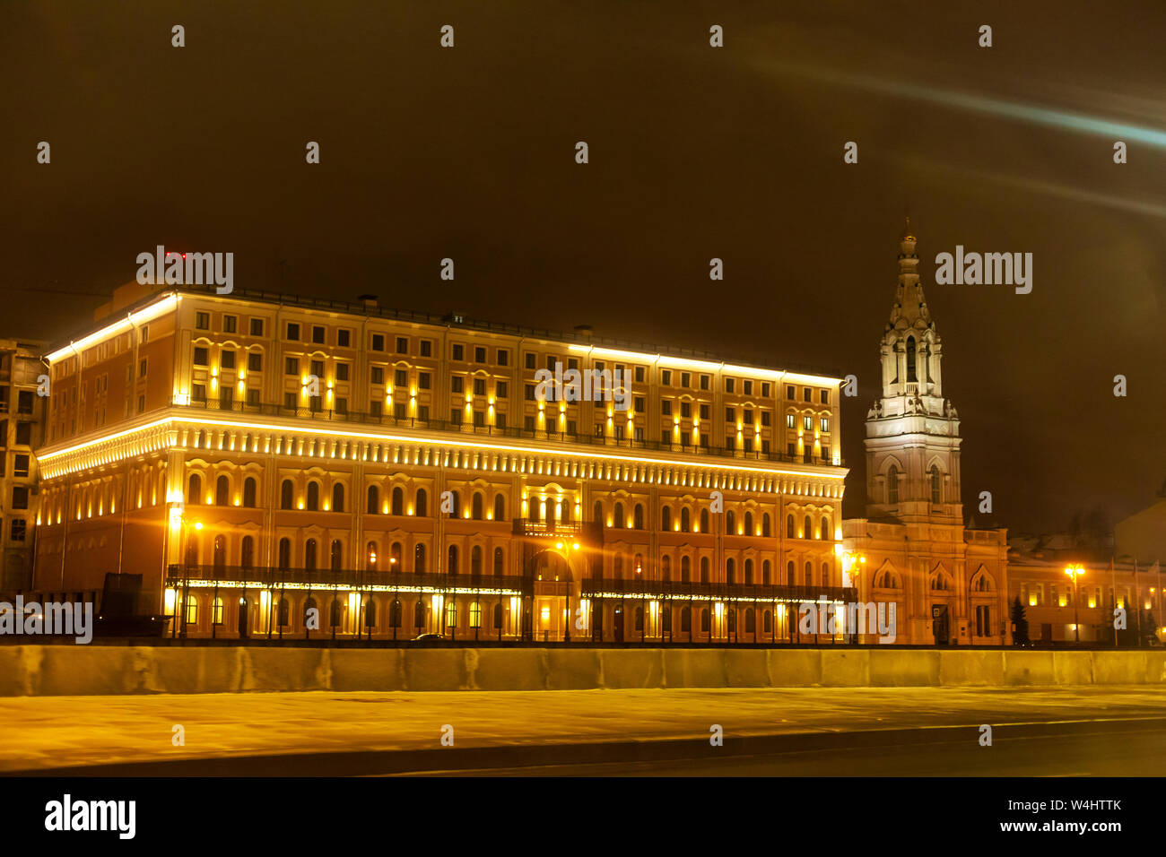 empty streets of the night city with yellow lanterns. Night cityscape ...