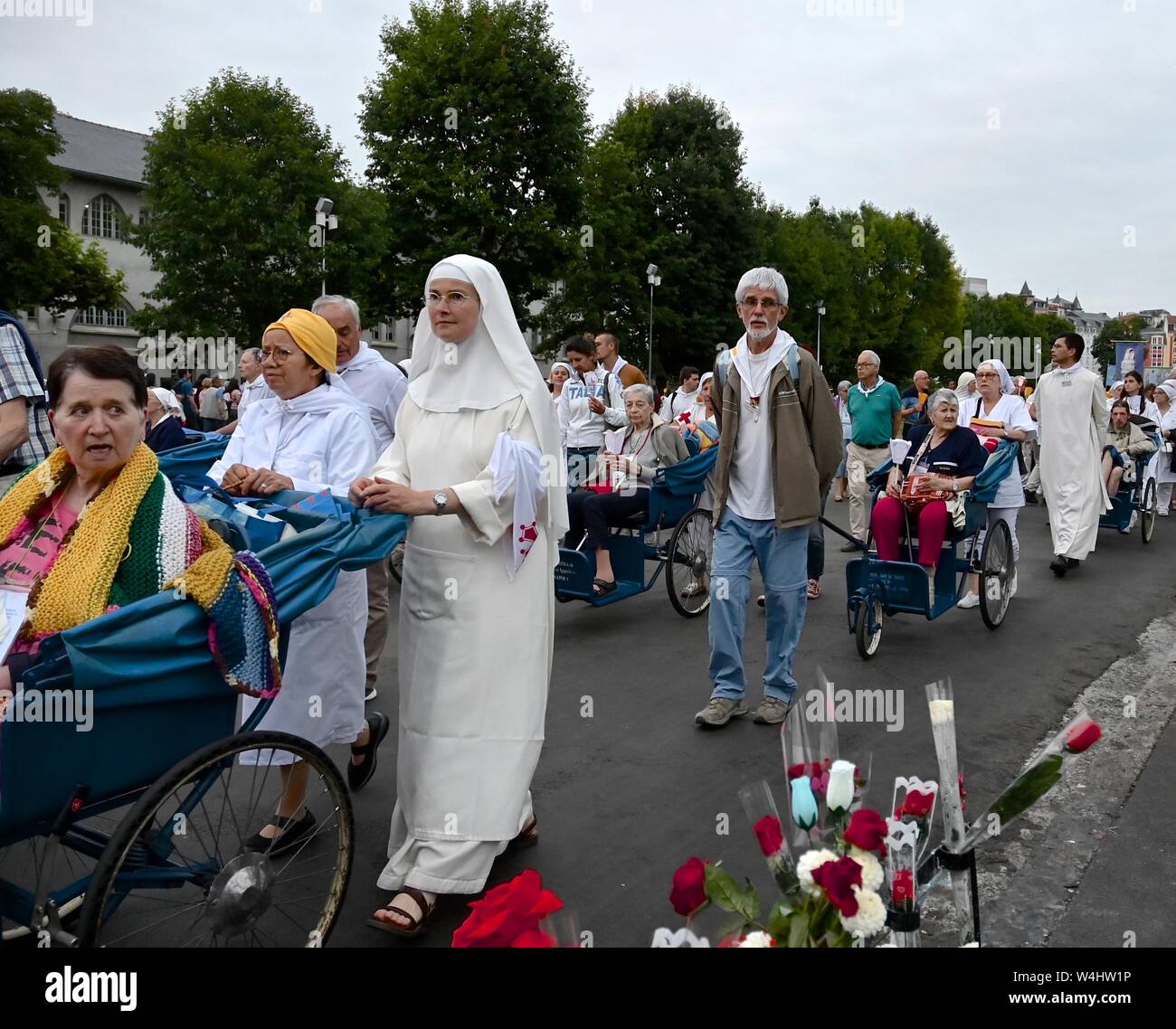 Pilgrims in the Marian procession in Lourdes, France Stock Photo - Alamy