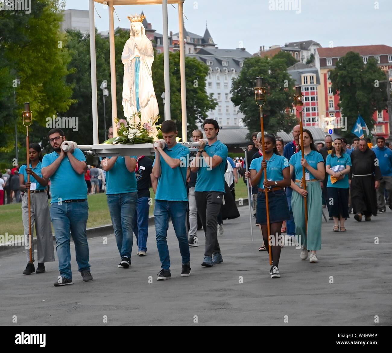Pilgrims in the Marian procession in Lourdes, France Stock Photo - Alamy