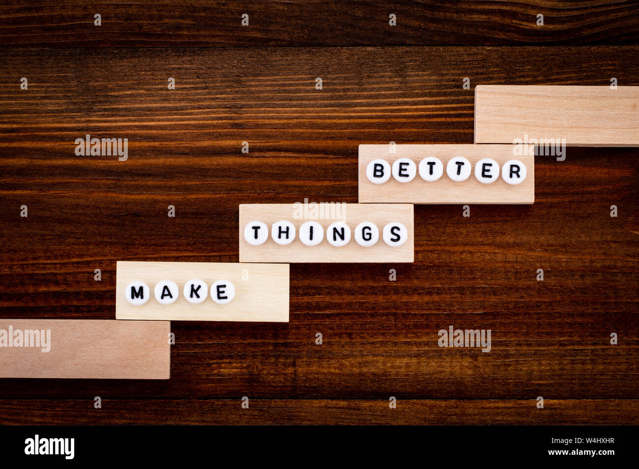 Make things better - Improvement Concept, wooden background Stock Photo ...