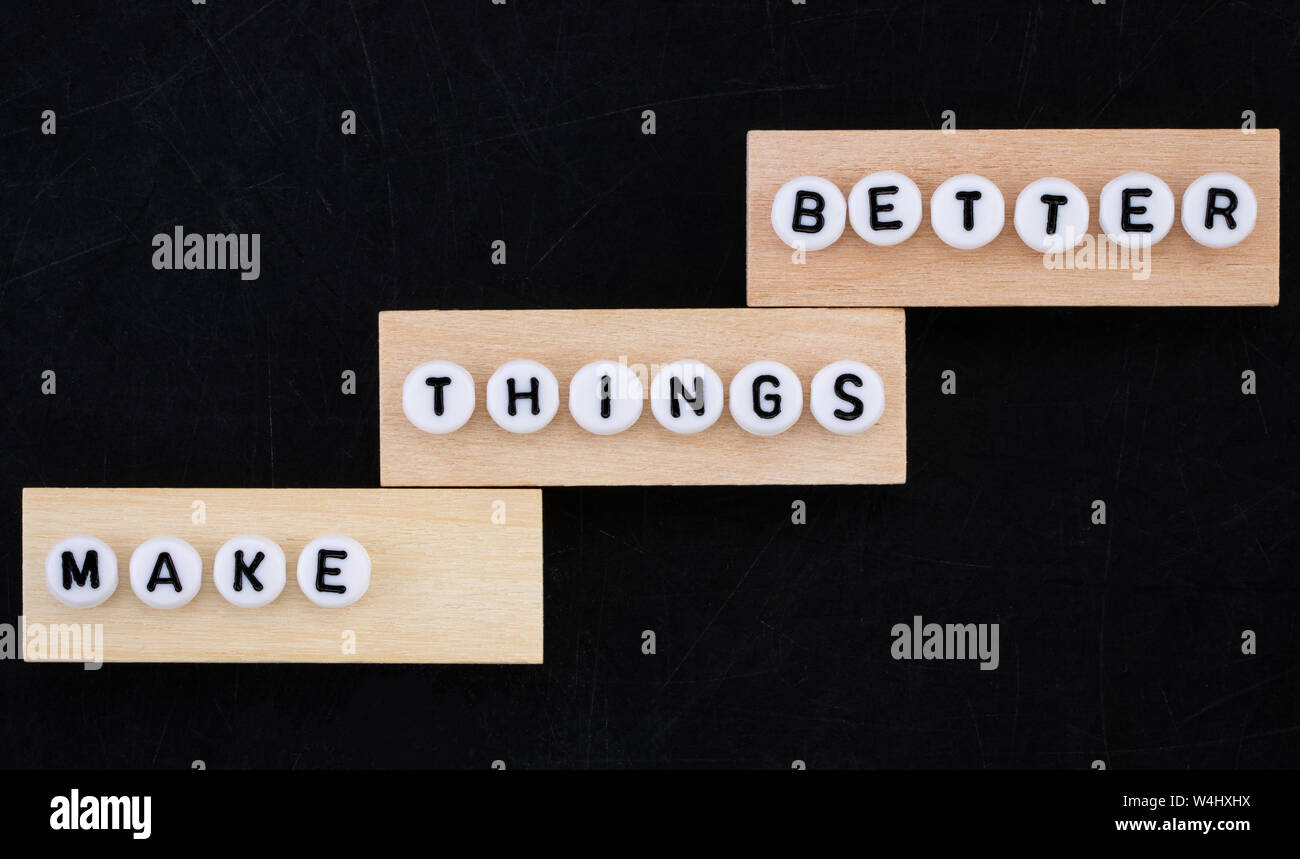 Make things better - Improvement Concept. Black background Stock Photo ...