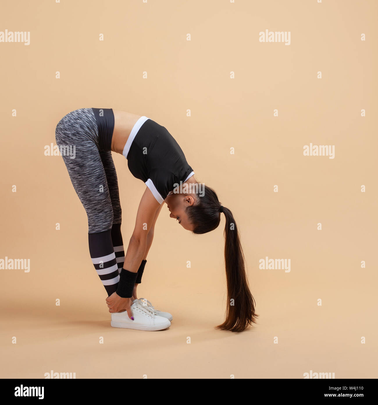 Bends forward hi-res stock photography and images - Alamy