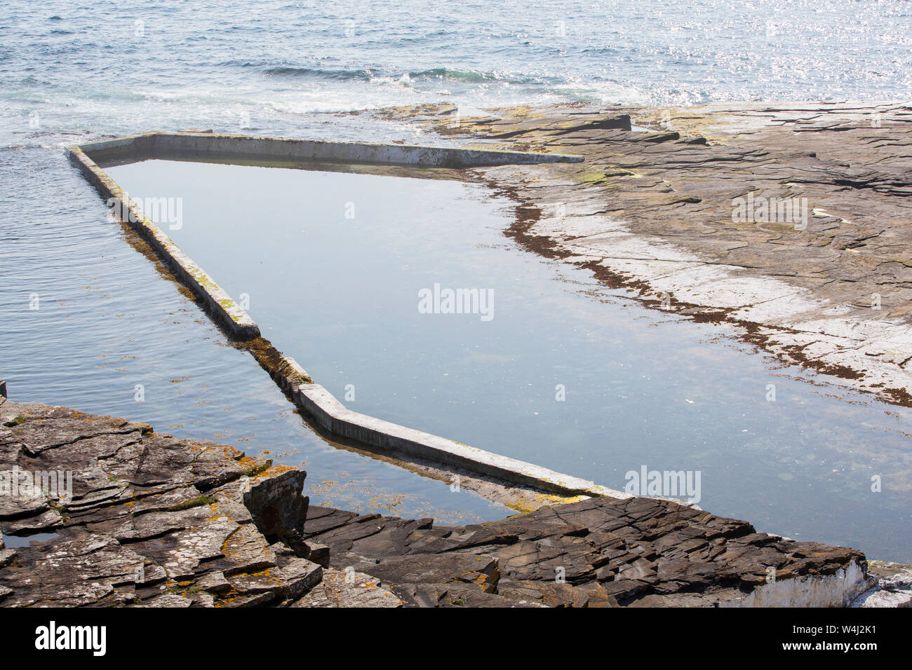The Trinkie, a tidal swimming pool on the coast a t Wick, Scotland, UK ...