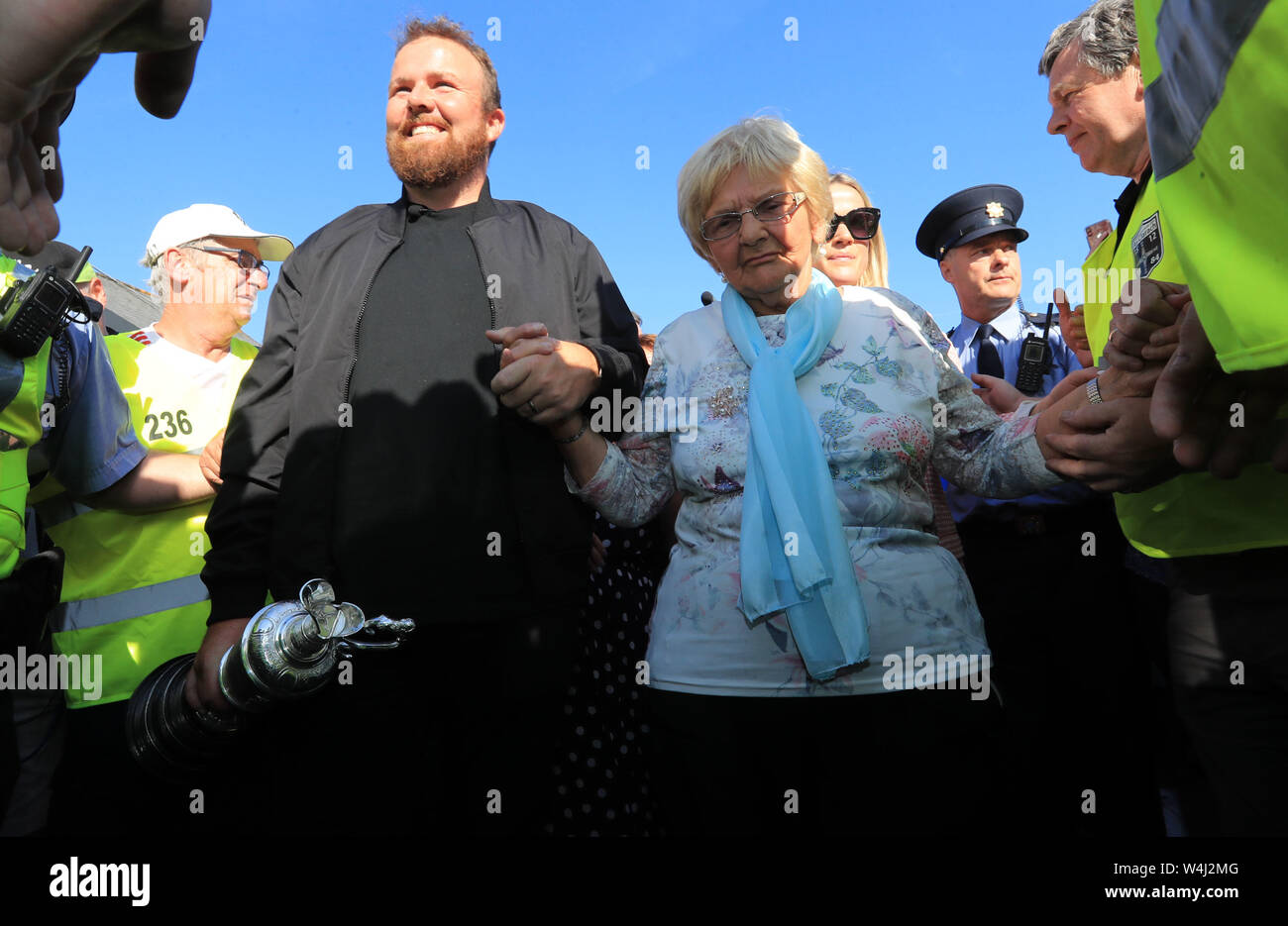Shane Lowry with his grandmother Emily Scanlon and the Claret Jug ...