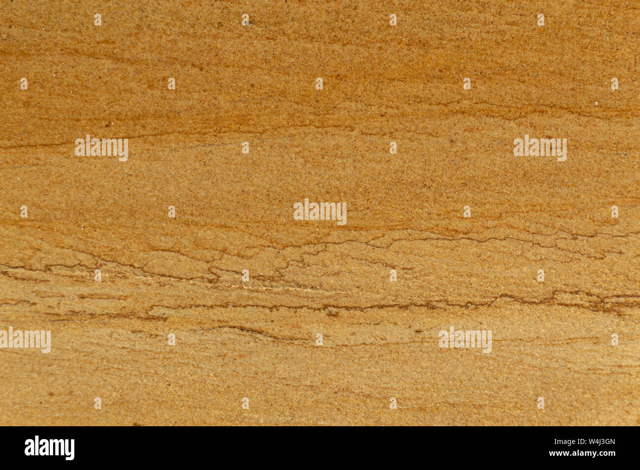 Yellow rough sand stone texture close up background Stock Photo - Alamy