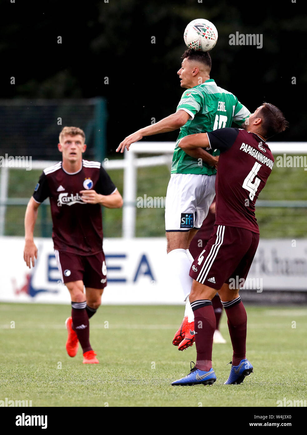 The New Saints' Dean Ebbe (centre) and Copenhagen's Sotirios ...