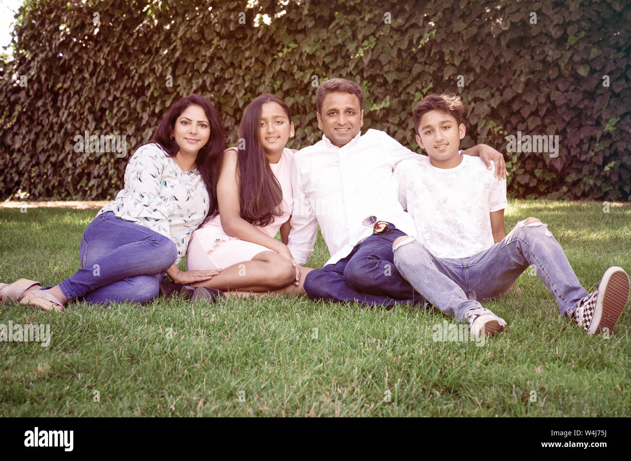 A Relaxed and happy family Stock Photo - Alamy