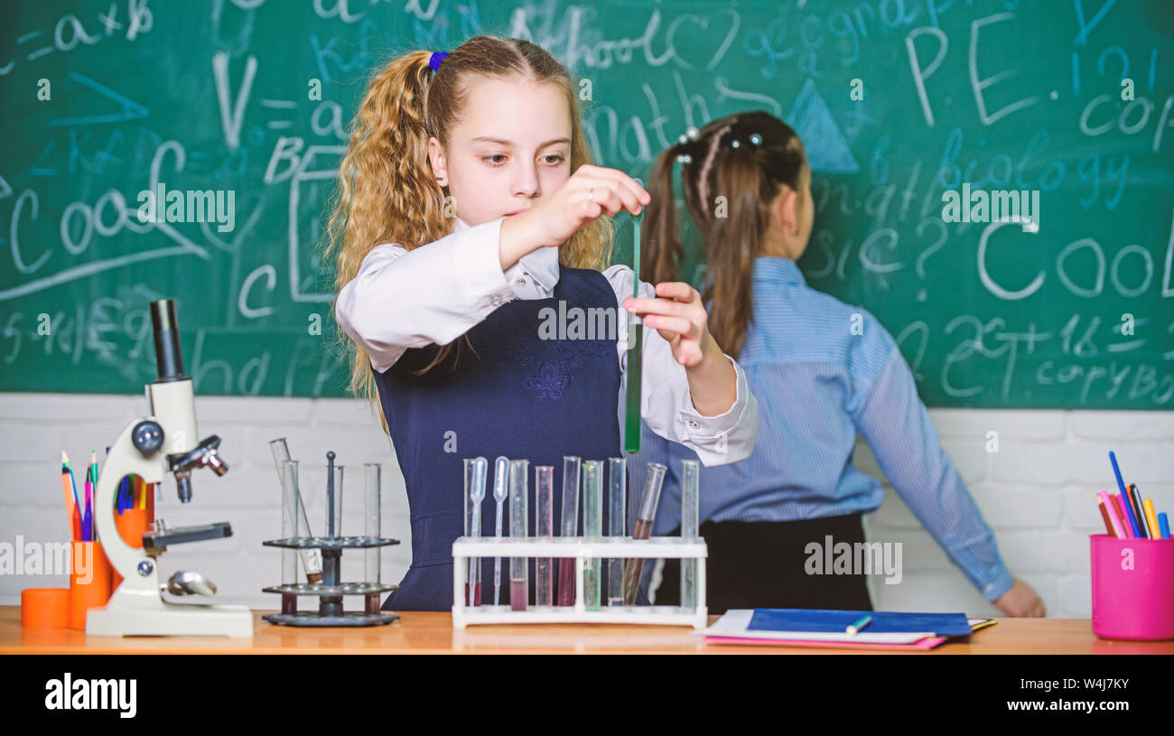 Preparing to exams. Lab microscope. childrens day. Little children at ...