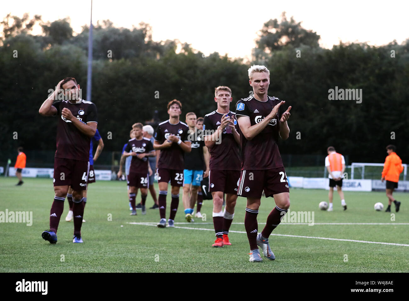 Copenhagen's Victor Nelsson (right) and team-mates applaud the fans ...