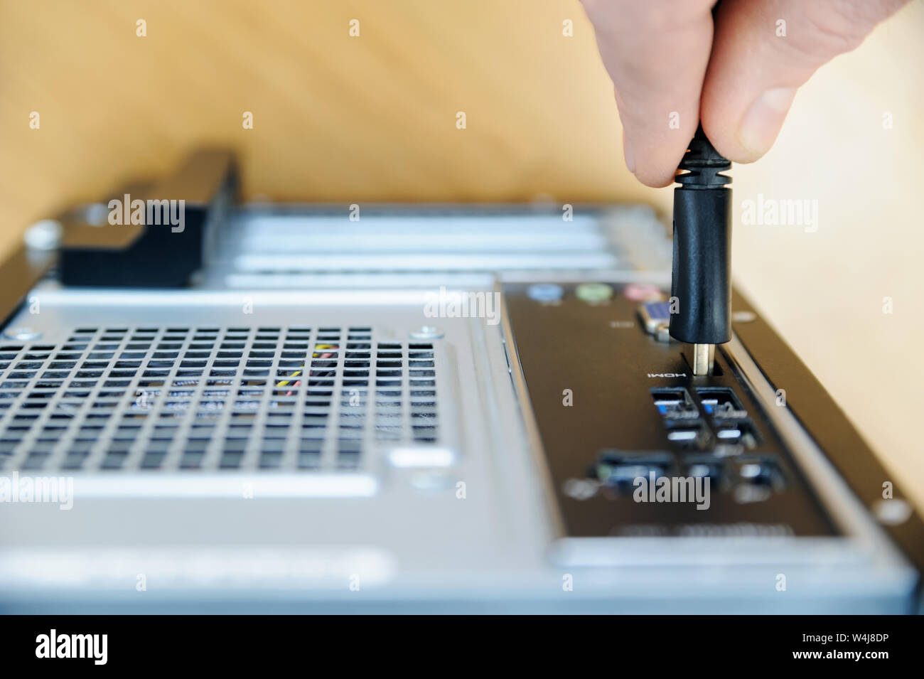 Plugging the device hi-res stock photography and images - Alamy