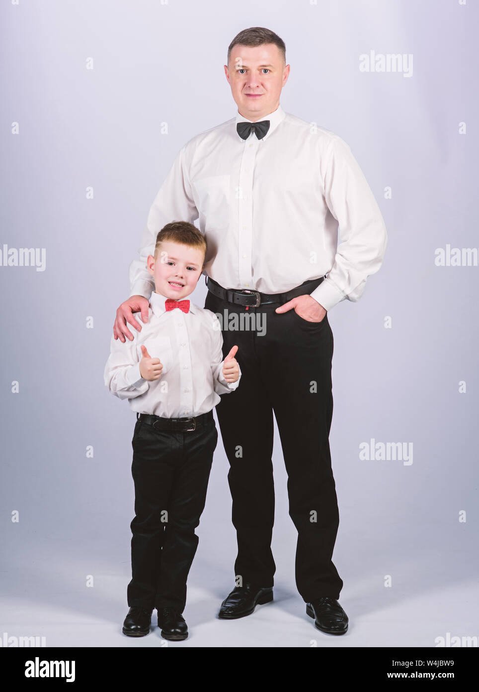 toffs father and son in formal suit. small boy with dad businessman ...