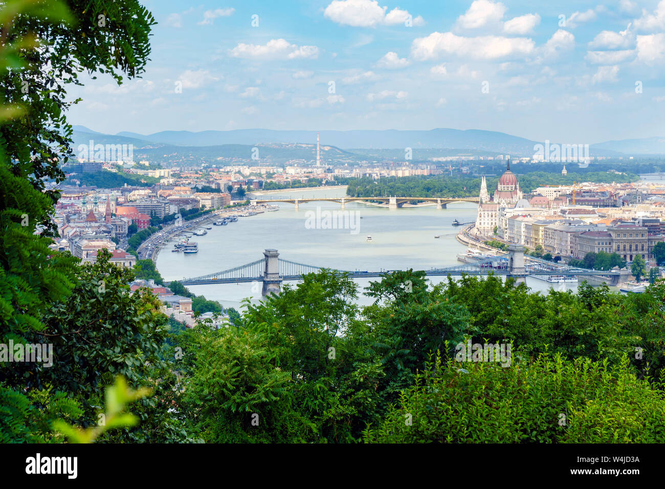 Panorama of Budapest over the Danube river. The bridges destroyed in ...
