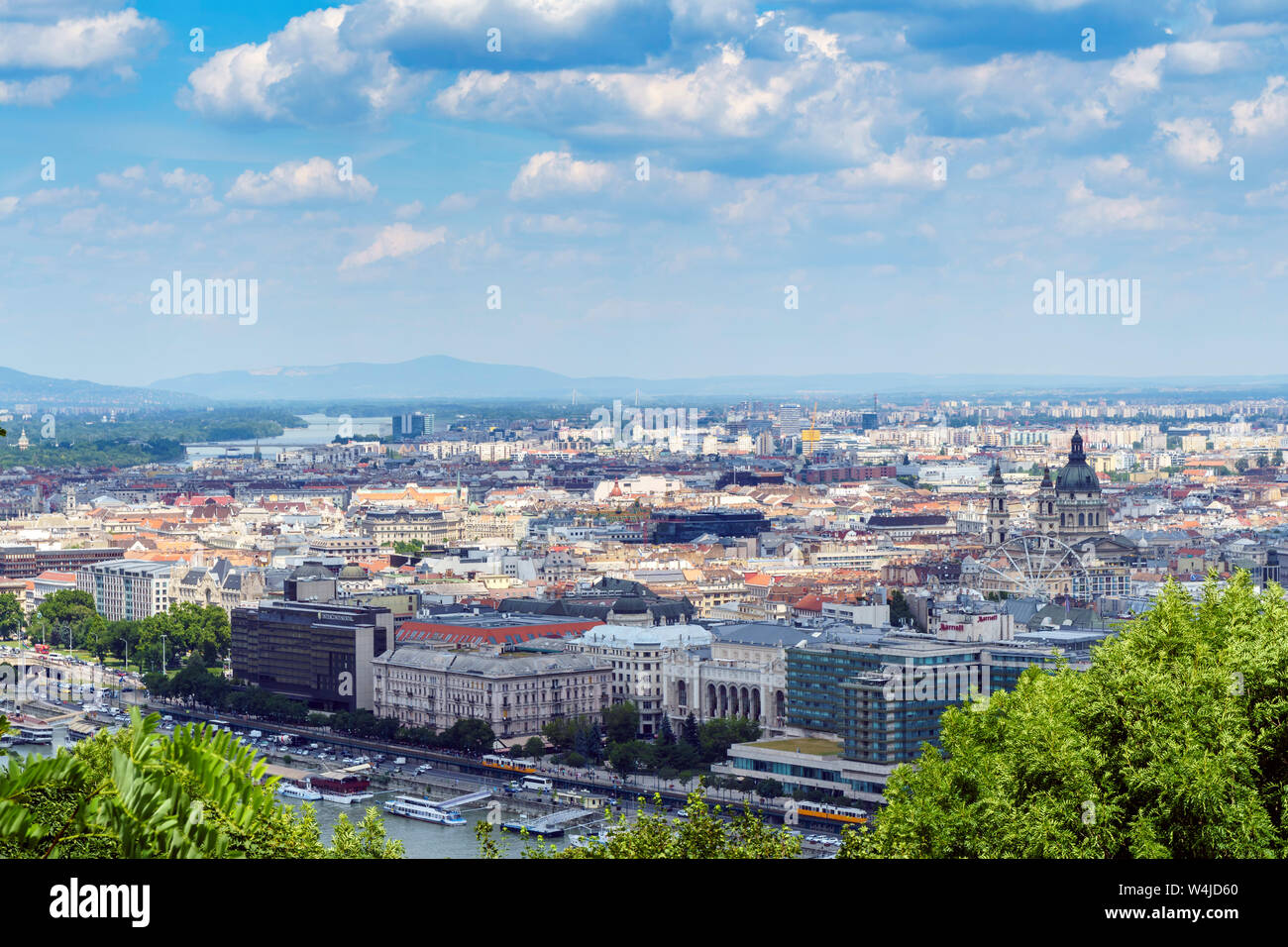 Panorama of Budapest over the Danube river. The bridges destroyed in ...