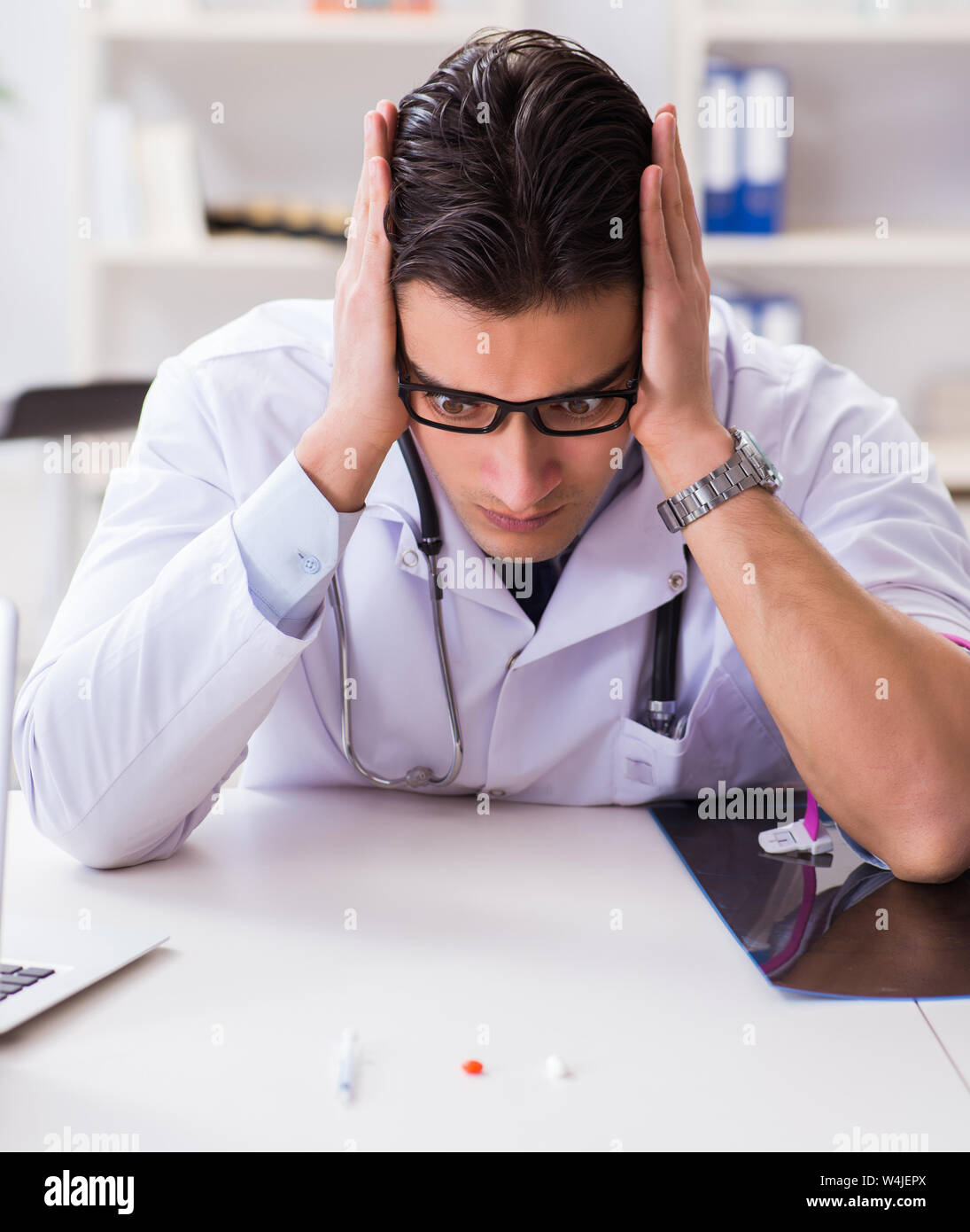 Doctor drug addict in the hospital Stock Photo - Alamy