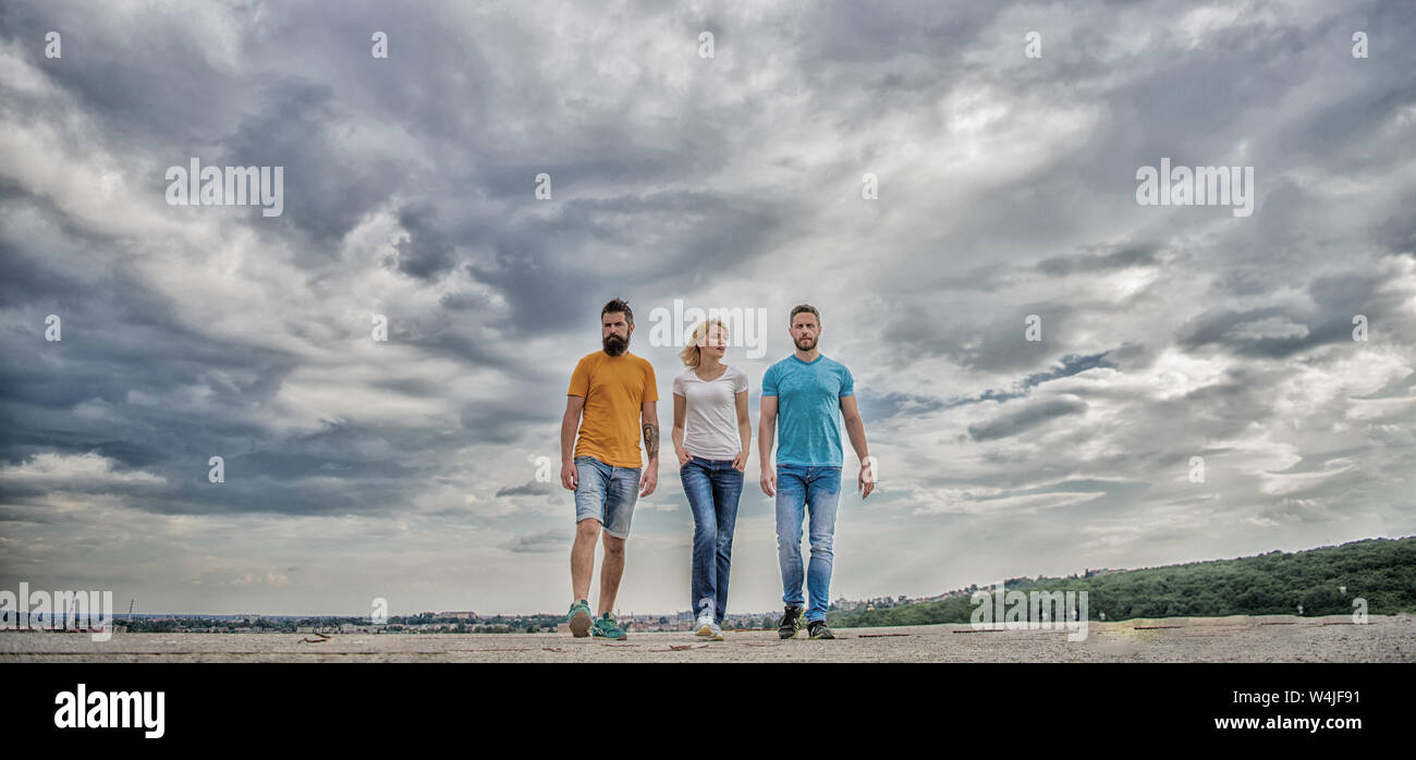 United threesome true friends. United group purposefully moves forward ...