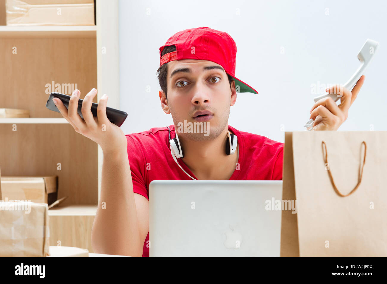 Call center worker at parcel distribution center in post office Stock ...