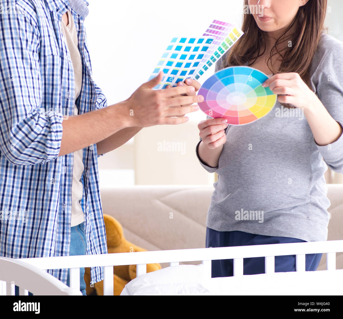 Young parents expecting their first baby Stock Photo - Alamy