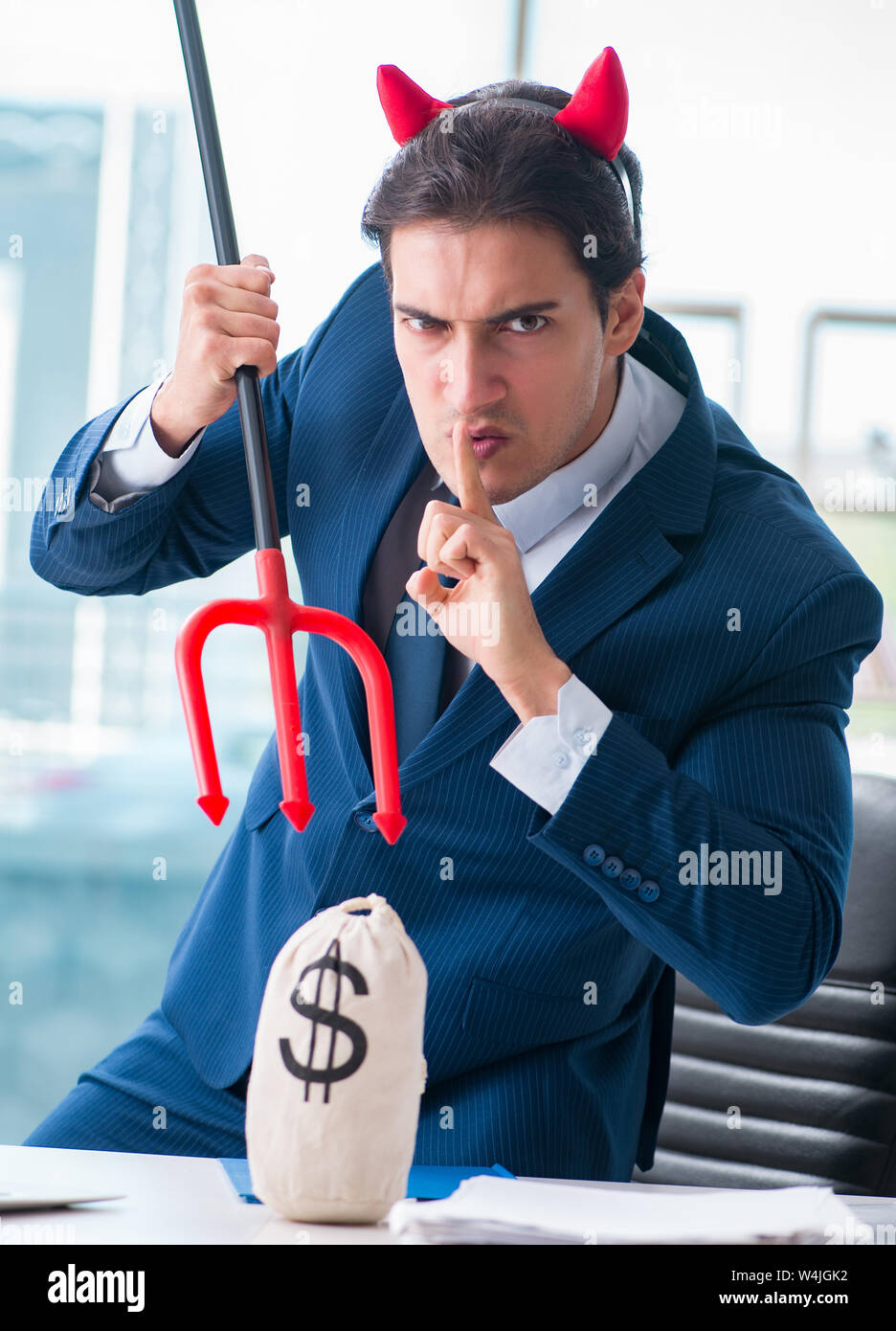 Devil angry businessman in the office Stock Photo - Alamy