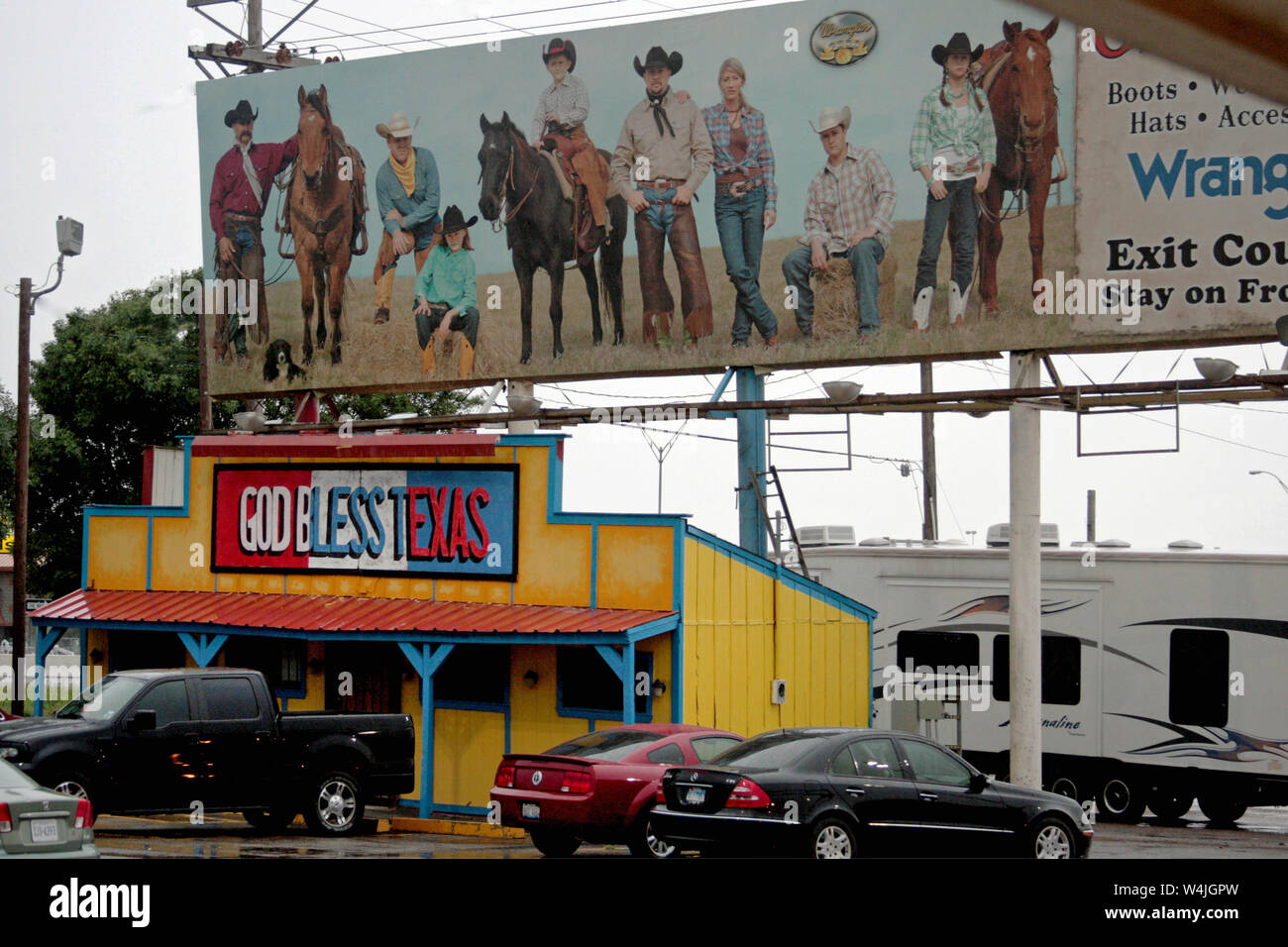 God Bless Texas sign and large billboard featuring cowboys in Amarillo ...