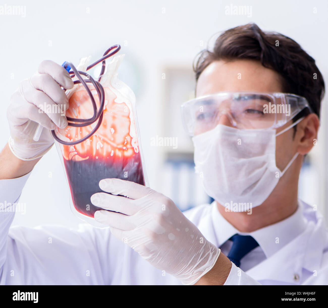 Doctor working with blood samples in hospital clinic lab Stock Photo ...