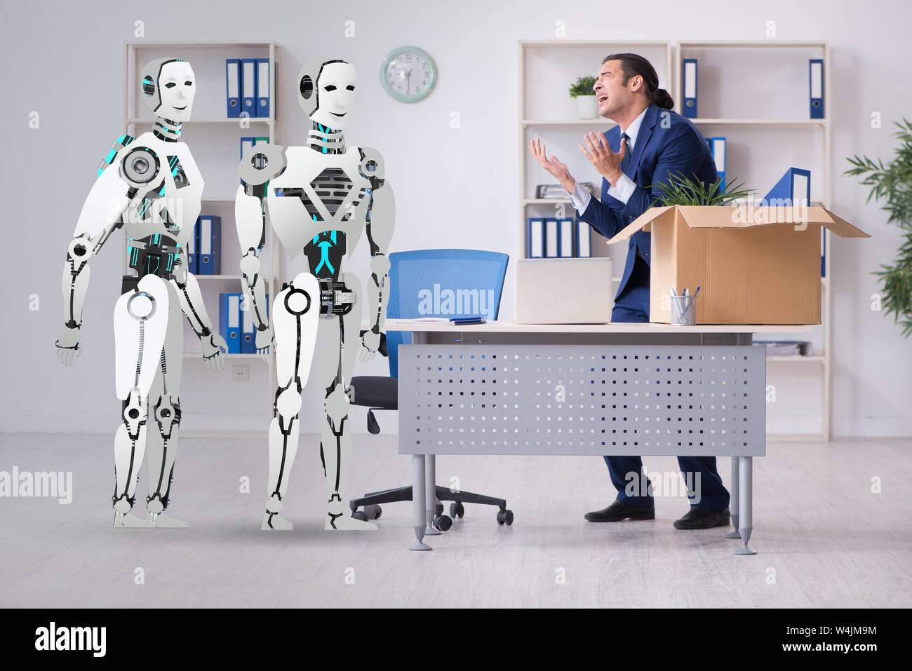 Concept of robots replacing humans in offices Stock Photo - Alamy