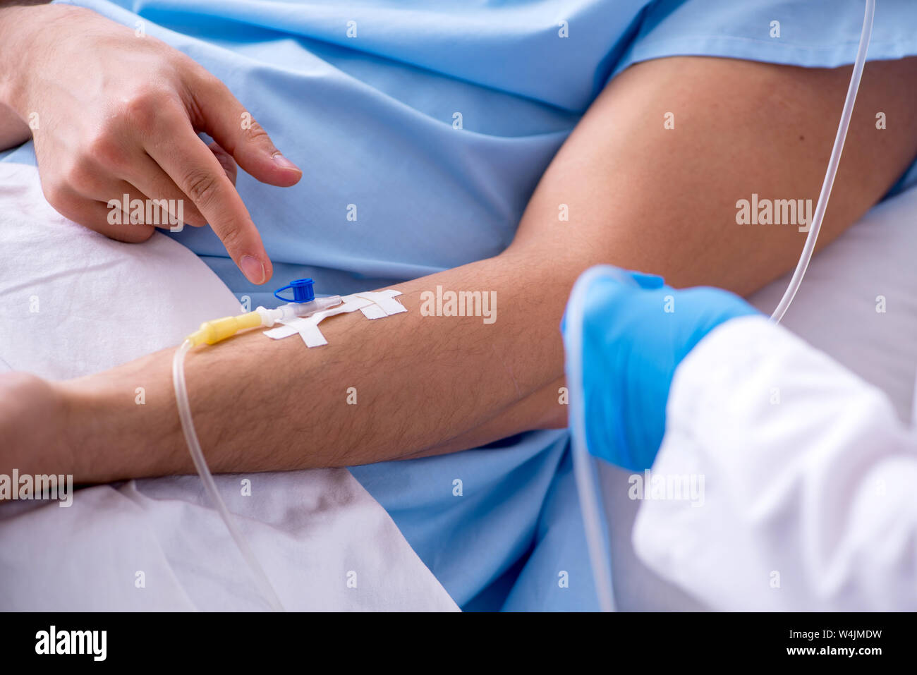 Male patient in blood transfusion concept Stock Photo - Alamy