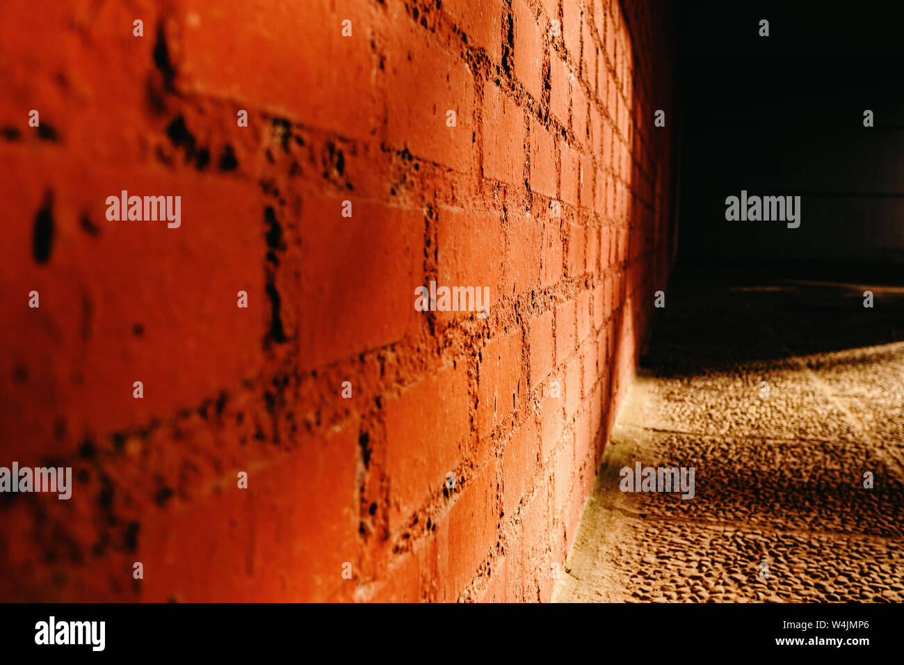 Solid brick background of a sunlit wall Stock Photo - Alamy
