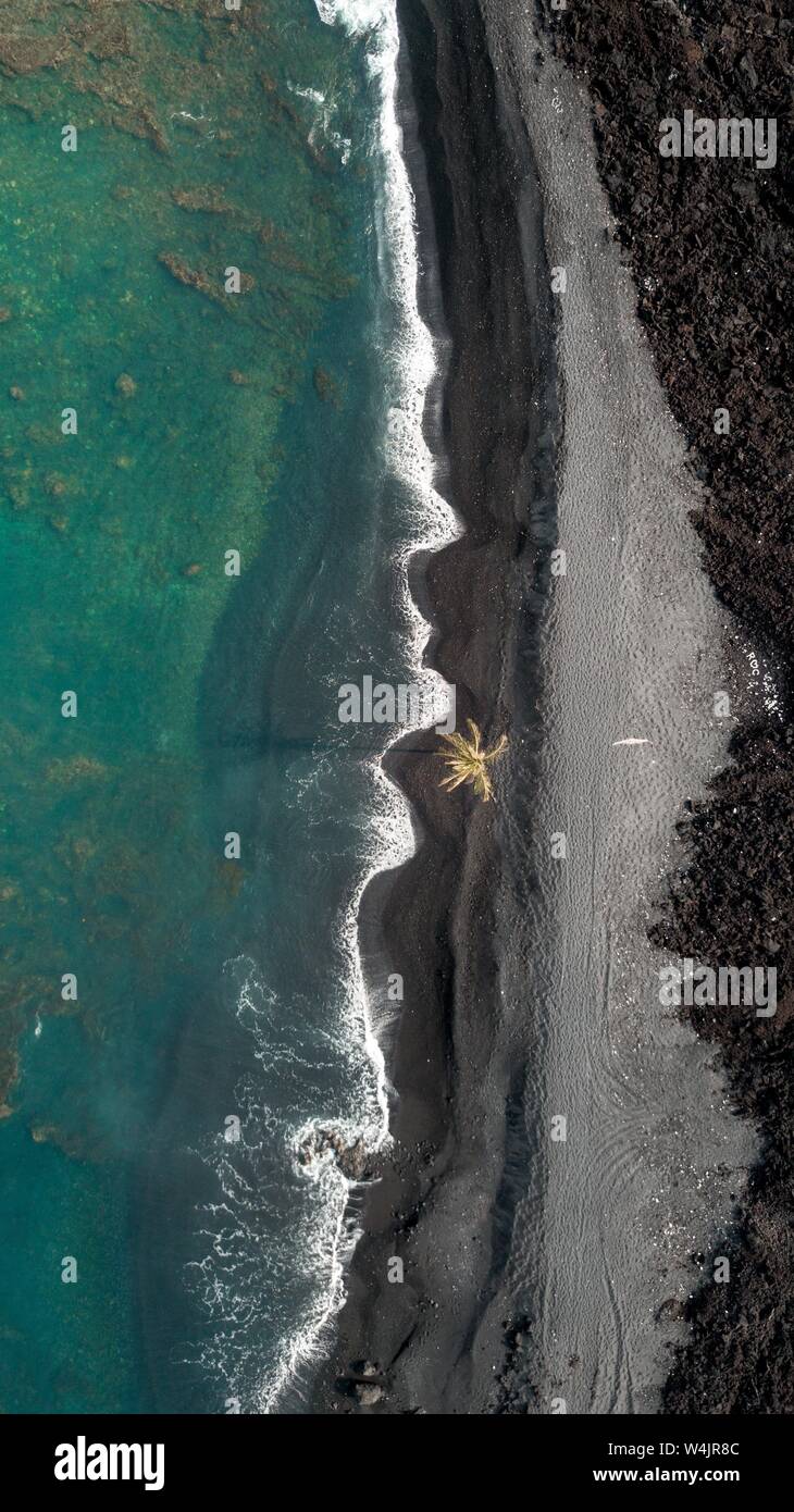 Aerial overhead vertical shot of the coastline of the sea with amazing ...