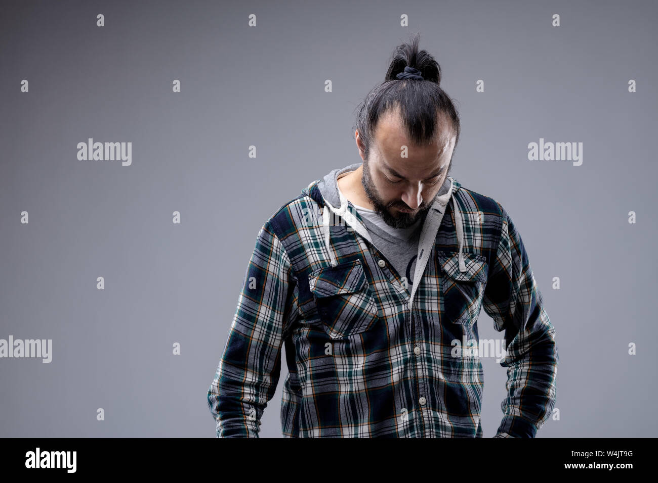 Look morose hi-res stock photography and images - Alamy