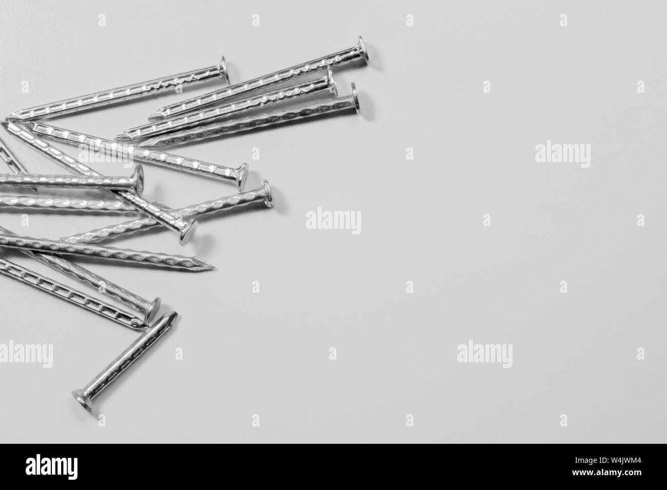 Metal nails isolated on white background Stock Photo - Alamy