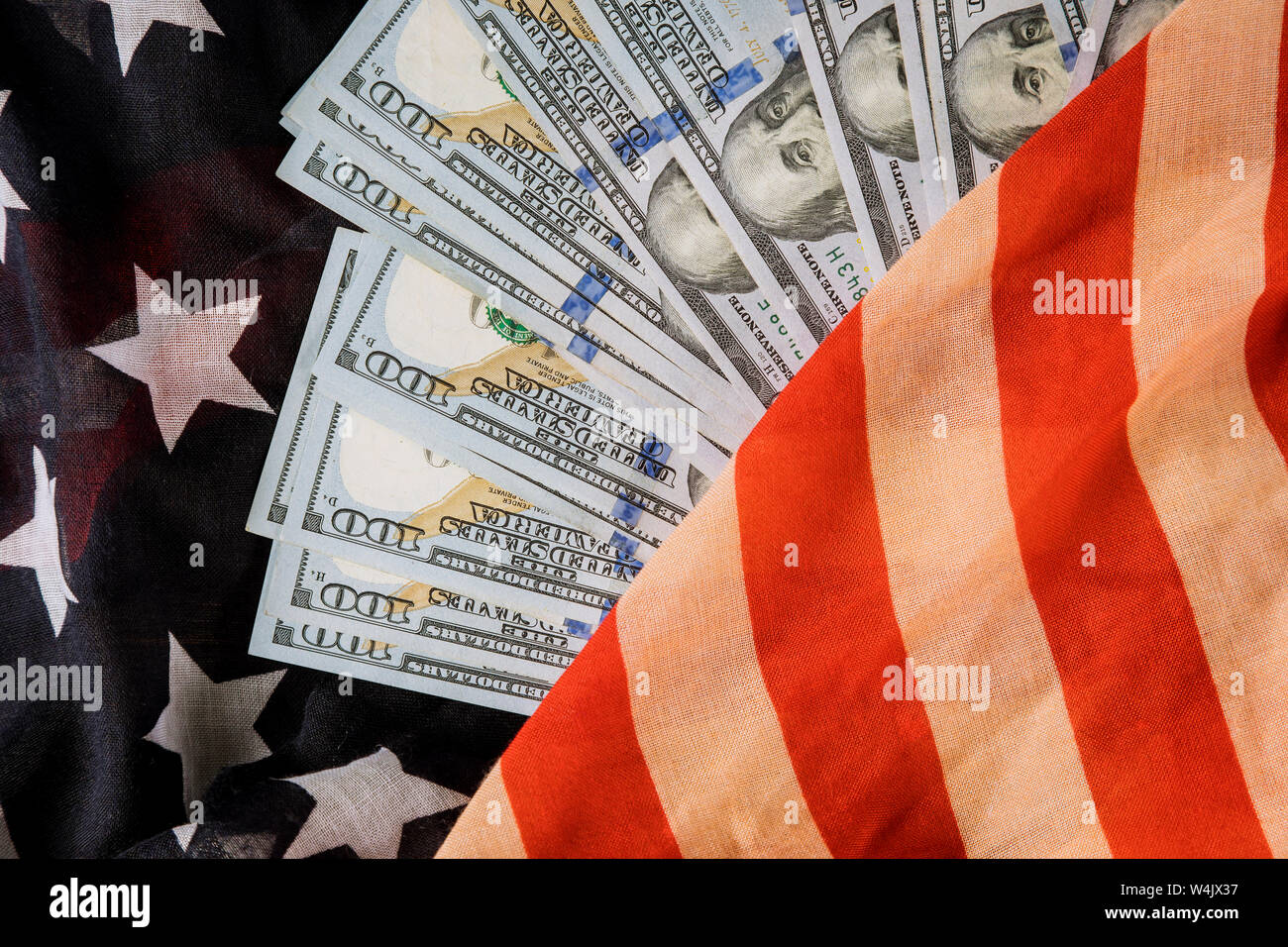 USA economic top view american flag on US dollars background Stock ...