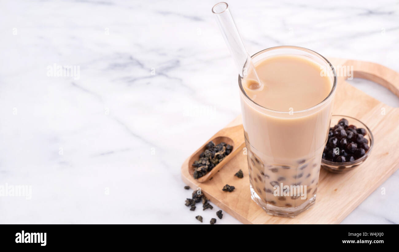 Tapioca pearl ball bubble milk tea, popular Taiwan drink, in drinking ...