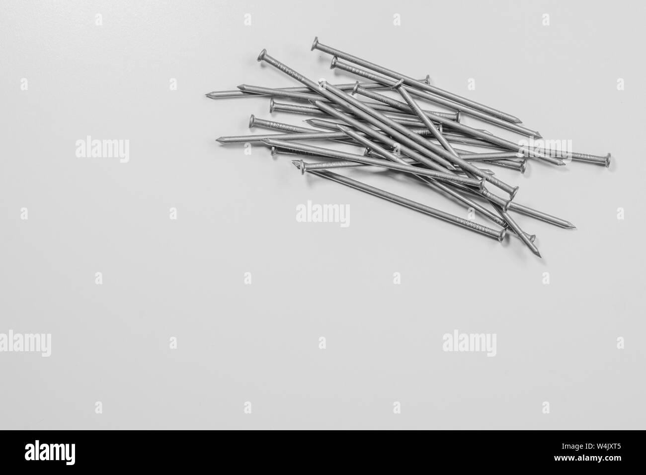 Metal nails isolated on white background Stock Photo - Alamy