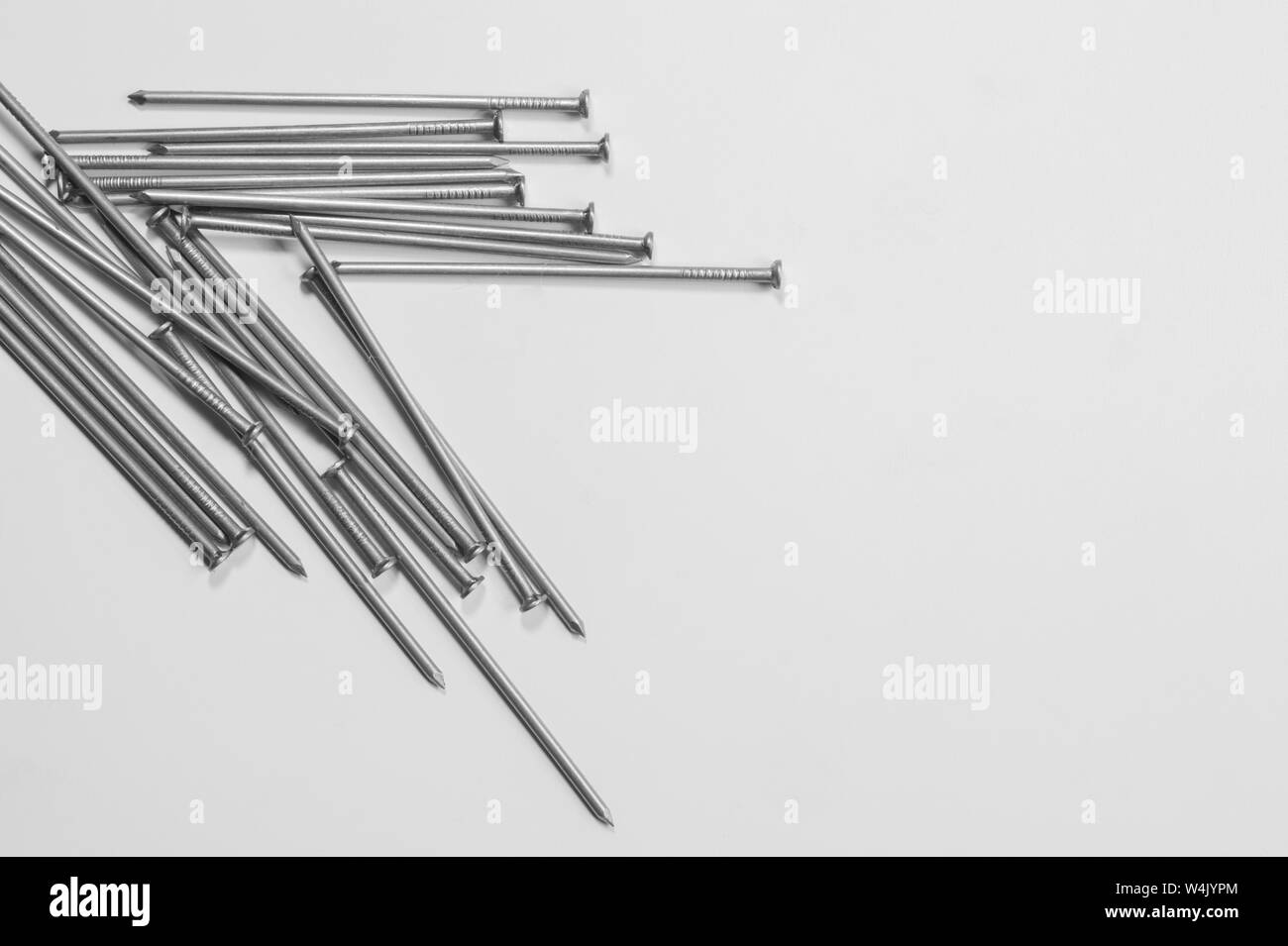 Metal nails isolated on white background Stock Photo - Alamy